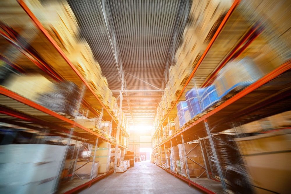 Why You Need a Pallet Positioner for Your Warehouse